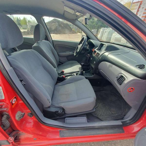 Red Nissan Almera 2003 in Klaipeda, with an engine capacity of 2.18 L and mileage of 336 thousand km for 650 €, photo 3 on AUTOMOTO.COM.LV