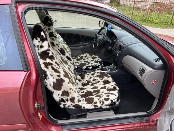 Sarkans Nissan Almera 2003 Rēzekne, ar dzinēja tilpumu 1.50 L un nobraukumu 222 tūkst. km par 950 €, foto 4 vietnē AUTOMOTO.COM.LV