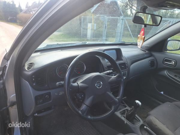 Nissan Almera 2006 Tallina, ar dzinēja tilpumu 1.80 L un nobraukumu 177 tūkst. km par 1200 €, foto 8 vietnē AUTOMOTO.COM.LV