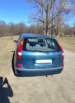 Blue Nissan Almera Tino 2003 in Vilnius, with an engine capacity of 1.80 L and mileage of 242 thousand km for 855 €, photo 3 on AUTOMOTO.COM.LV