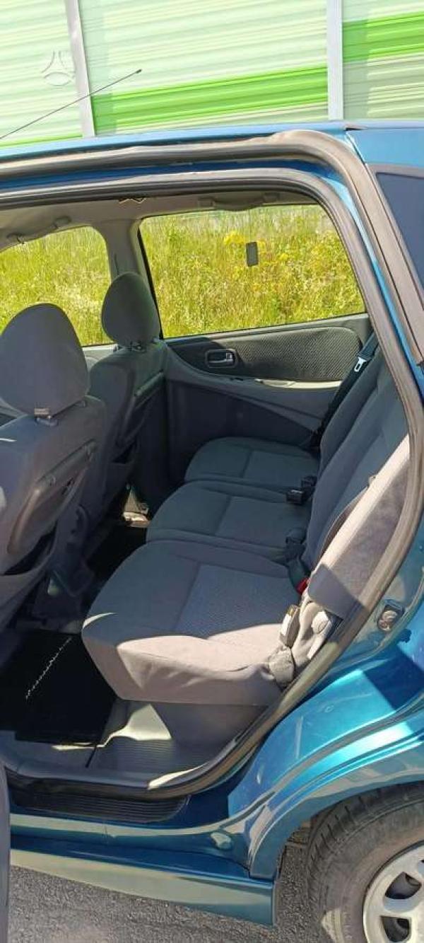 Blue Nissan Almera Tino 2004 in Kaunas, with an engine capacity of 1.77 L and mileage of 275 thousand km for 950 €, photo 9 on AUTOMOTO.COM.LV