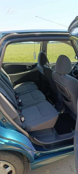 Zils Nissan Almera Tino 2004 Kauņa, ar dzinēja tilpumu 1.77 L un nobraukumu 275 tūkst. km par 950 €, foto 11 vietnē AUTOMOTO.COM.LV