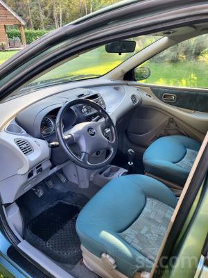 Green Nissan Almera Tino 2001 in Riga, with an engine capacity of 1.80 L and mileage of 92 thousand km for 2500 €, photo 11 on AUTOMOTO.COM.LV