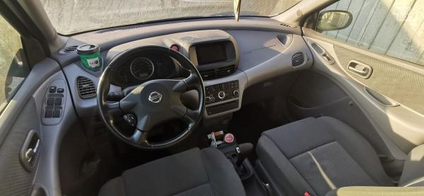 Zaļš Nissan Almera Tino 2005 Kauņa, ar dzinēja tilpumu 1.80 L un nobraukumu 201 tūkst. km par 399 €, foto 9 vietnē AUTOMOTO.COM.LV