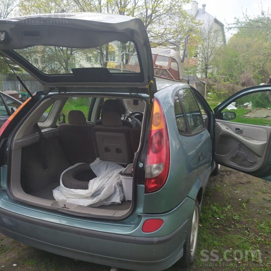 Green Nissan Almera Tino 2002 in Riga, with an engine capacity of 1.80 L and mileage of 220 thousand km for 650 €, photo 3 on AUTOMOTO.COM.LV