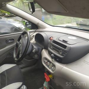 Green Nissan Almera Tino 2002 in Riga, with an engine capacity of 1.80 L and mileage of 220 thousand km for 650 €, photo 4 on AUTOMOTO.COM.LV