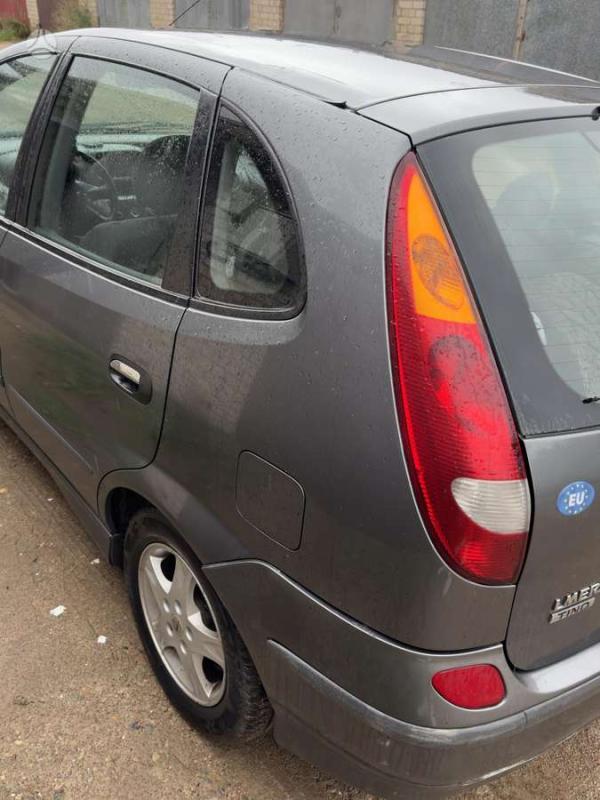 Pelēks Nissan Almera Tino 2004 Mažeikiai, ar dzinēja tilpumu 2.18 L un nobraukumu 269 tūkst. km par 900 €, foto 3 vietnē AUTOMOTO.COM.LV