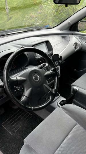 Grey Nissan Almera Tino 2004 in Vilnius, with an engine capacity of 1.77 L and mileage of 212 thousand km for 1000 €, photo 12 on AUTOMOTO.COM.LV