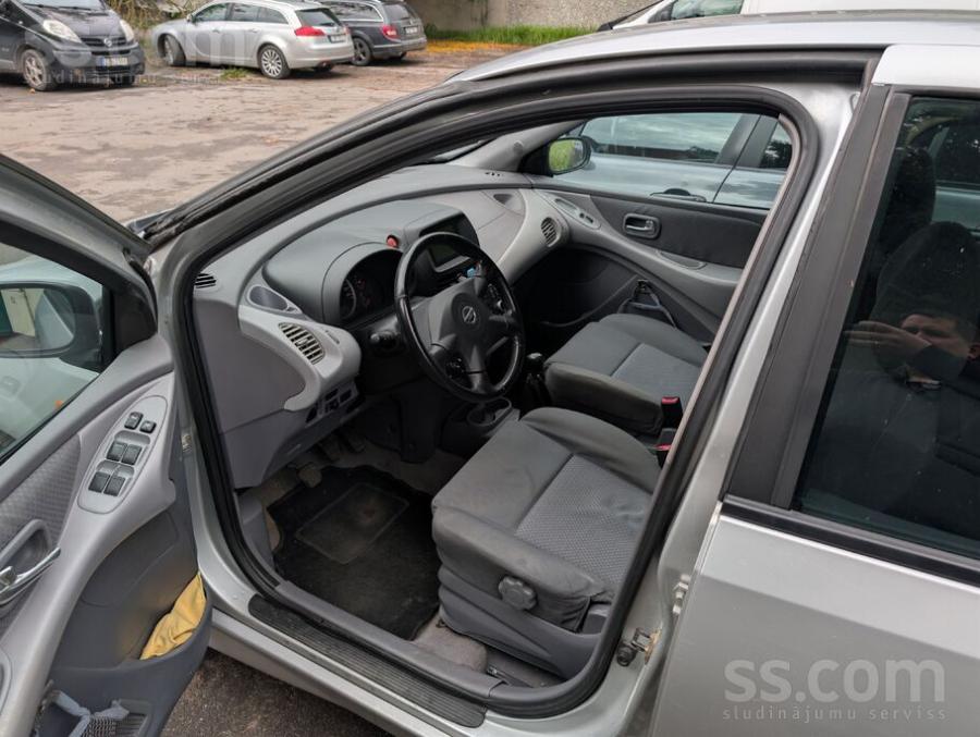 Pelēks Nissan Almera Tino 2005 Rīga, ar dzinēja tilpumu 2.20 L un nobraukumu 320 tūkst. km par 800 €, foto 5 vietnē AUTOMOTO.COM.LV