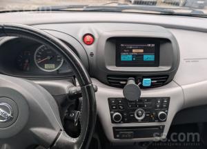 Pelēks Nissan Almera Tino 2005 Rīga, ar dzinēja tilpumu 2.20 L un nobraukumu 320 tūkst. km par 800 €, foto 6 vietnē AUTOMOTO.COM.LV