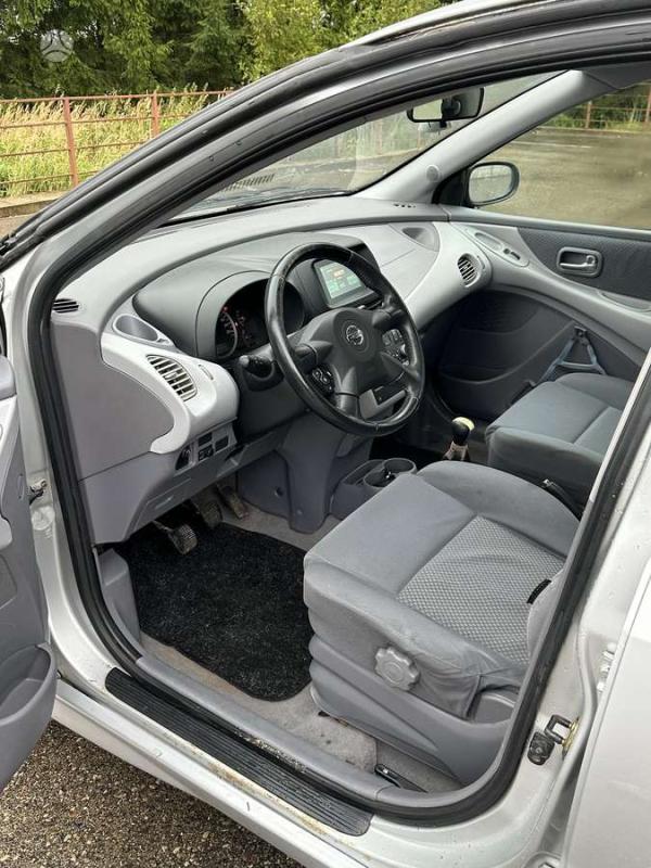 Pelēks Nissan Almera Tino 2006 Anykščiai, ar dzinēja tilpumu 2.18 L un nobraukumu 211 tūkst. km par 350 €, foto 10 vietnē AUTOMOTO.COM.LV