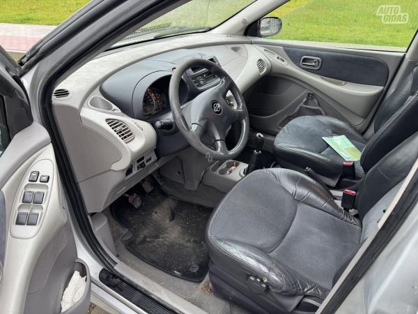 Grey Nissan Almera Tino 2002 in Ukmerge, with an engine capacity of 2.20 L and mileage of 231 thousand km for 480 €, photo 9 on AUTOMOTO.COM.LV