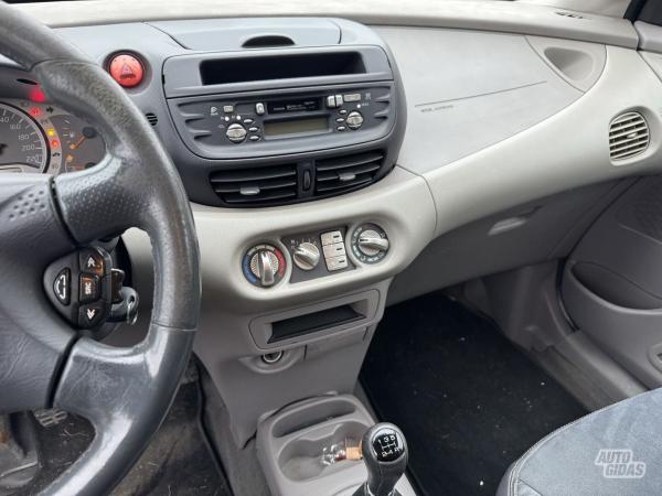 Grey Nissan Almera Tino 2002 in Ukmerge, with an engine capacity of 2.20 L and mileage of 231 thousand km for 480 €, photo 10 on AUTOMOTO.COM.LV