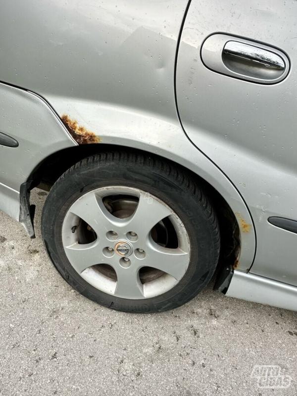 Pelēks Nissan Almera Tino 2002 Kelmė, ar dzinēja tilpumu 1.80 L un nobraukumu 225 tūkst. km par 450 €, foto 4 vietnē AUTOMOTO.COM.LV