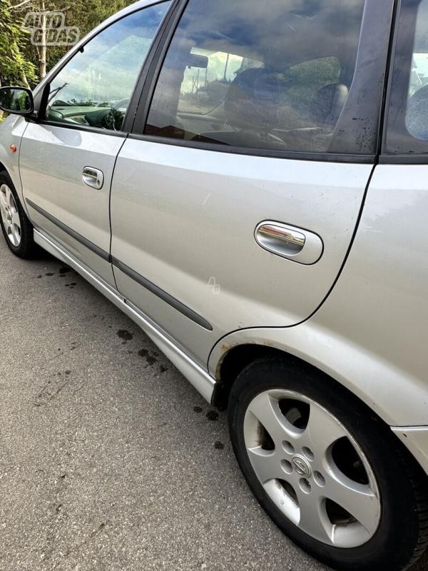 Pelēks Nissan Almera Tino 2002 Kelmė, ar dzinēja tilpumu 1.80 L un nobraukumu 225 tūkst. km par 450 €, foto 7 vietnē AUTOMOTO.COM.LV