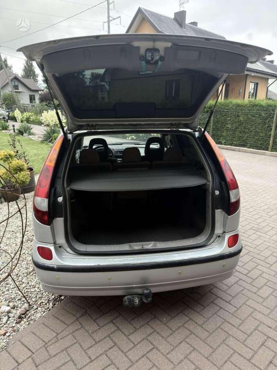 Pelēks Nissan Almera Tino 2002 Plungė, ar dzinēja tilpumu 2.18 L un nobraukumu 320 tūkst. km par 600 €, foto 3 vietnē AUTOMOTO.COM.LV