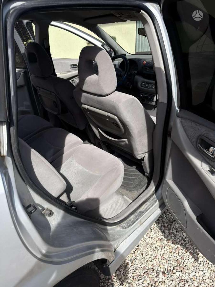 Pelēks Nissan Almera Tino 2002 Plungė, ar dzinēja tilpumu 2.18 L un nobraukumu 320 tūkst. km par 600 €, foto 7 vietnē AUTOMOTO.COM.LV