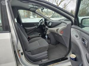 Pelēks Nissan Almera Tino 2003 Radviliškis, ar dzinēja tilpumu 2.20 L un nobraukumu 276 tūkst. km par 995 €, foto 14 vietnē AUTOMOTO.COM.LV