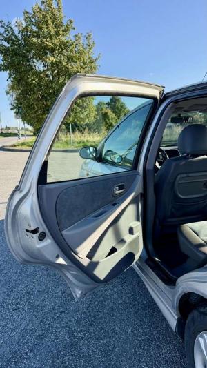 Pelēks Nissan Almera Tino 2003 Klaipėda, ar dzinēja tilpumu 2.18 L un nobraukumu 278 tūkst. km par 1500 €, foto 21 vietnē AUTOMOTO.COM.LV