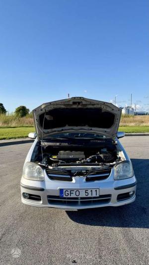 Pelēks Nissan Almera Tino 2003 Klaipėda, ar dzinēja tilpumu 2.18 L un nobraukumu 278 tūkst. km par 1500 €, foto 41 vietnē AUTOMOTO.COM.LV