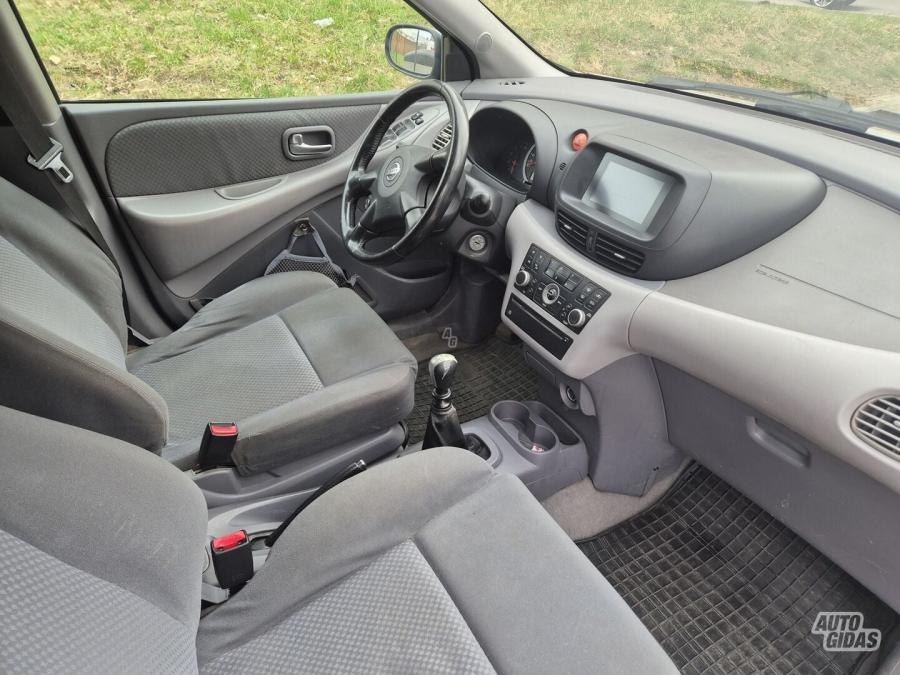 Grey Nissan Almera Tino 2005 in Klaipeda, with an engine capacity of 2.20 L and mileage of 253 thousand km for 650 €, photo 13 on AUTOMOTO.COM.LV