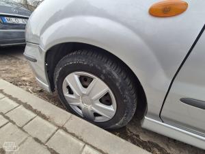 Grey Nissan Almera Tino 2005 in Klaipeda, with an engine capacity of 2.20 L and mileage of 253 thousand km for 650 €, photo 18 on AUTOMOTO.COM.LV