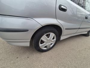 Grey Nissan Almera Tino 2005 in Klaipeda, with an engine capacity of 2.20 L and mileage of 253 thousand km for 650 €, photo 20 on AUTOMOTO.COM.LV