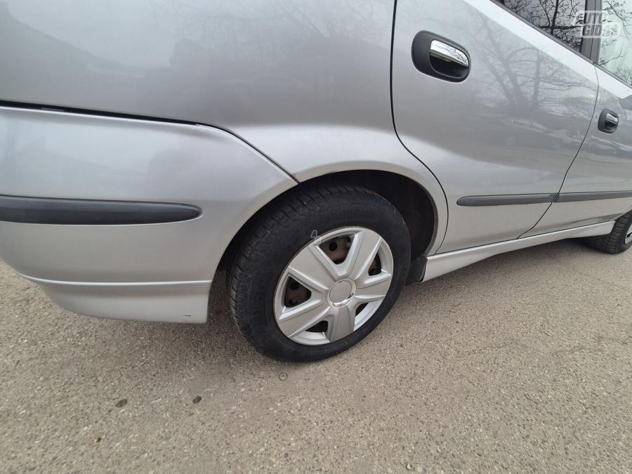 Grey Nissan Almera Tino 2005 in Klaipeda, with an engine capacity of 2.20 L and mileage of 253 thousand km for 650 €, photo 20 on AUTOMOTO.COM.LV