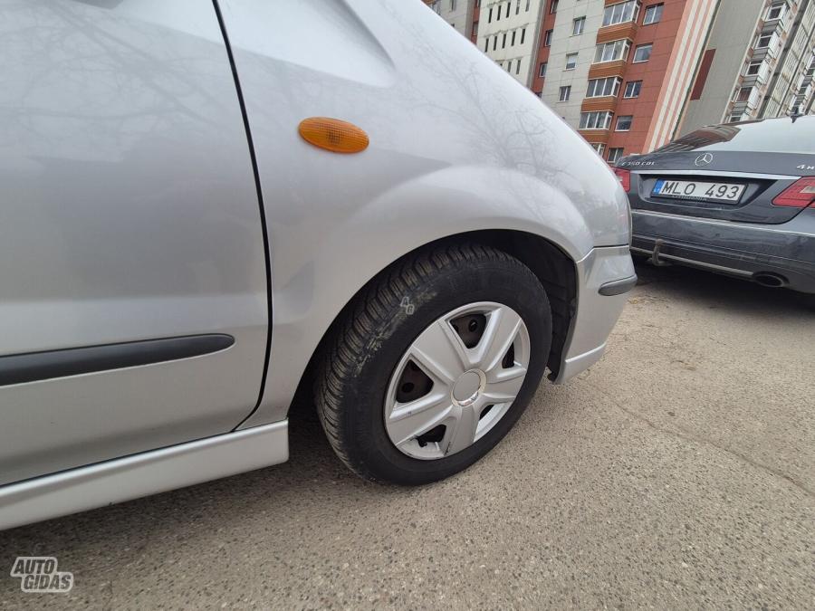 Grey Nissan Almera Tino 2005 in Klaipeda, with an engine capacity of 2.20 L and mileage of 253 thousand km for 650 €, photo 21 on AUTOMOTO.COM.LV