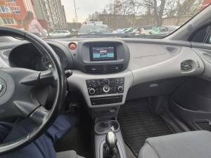 Grey Nissan Almera Tino 2005 in Klaipeda, with an engine capacity of 2.20 L and mileage of 253 thousand km for 650 €, photo 26 on AUTOMOTO.COM.LV
