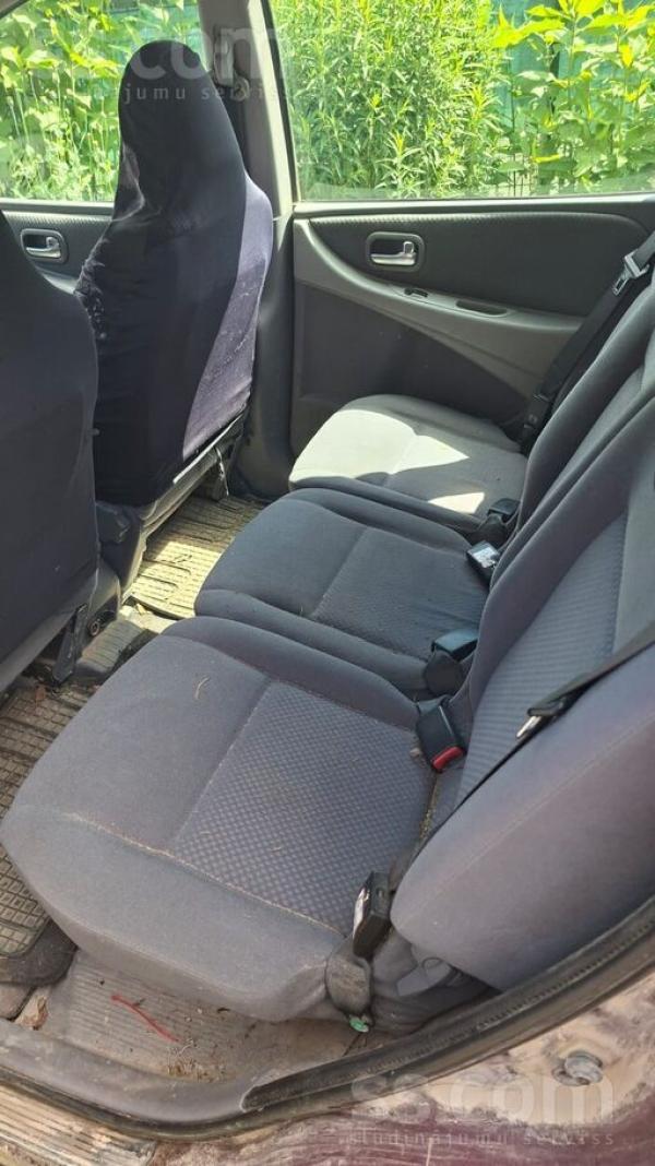 Sarkans Nissan Almera Tino 2003 Jēkabpils, ar dzinēja tilpumu 2.20 L un nobraukumu 358 tūkst. km par 390 €, foto 4 vietnē AUTOMOTO.COM.LV