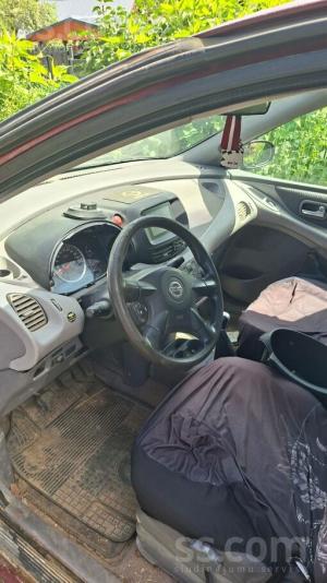 Sarkans Nissan Almera Tino 2003 Jēkabpils, ar dzinēja tilpumu 2.20 L un nobraukumu 358 tūkst. km par 390 €, foto 8 vietnē AUTOMOTO.COM.LV