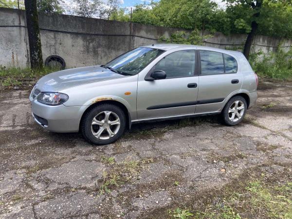 Dzeltens Nissan Almera 2003 Kauņa, ar dzinēja tilpumu 1.50 L un nobraukumu 165 tūkst. km par 750 €, foto 4 vietnē AUTOMOTO.COM.LV