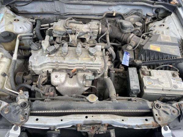 Yellow Nissan Almera 2003 in Kaunas, with an engine capacity of 1.50 L and mileage of 165 thousand km for 750 €, photo 6 on AUTOMOTO.COM.LV