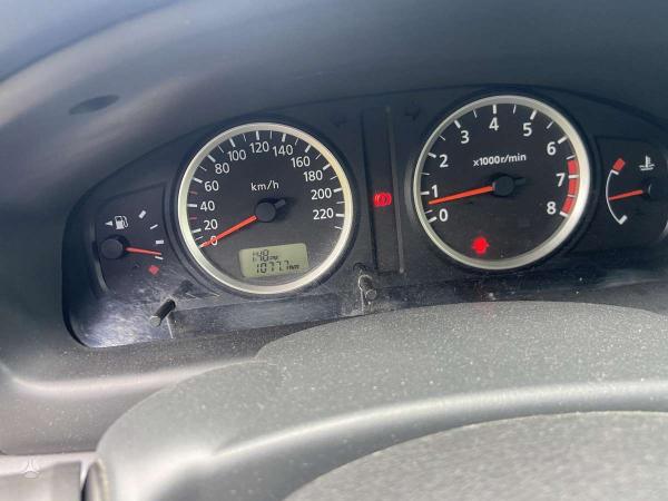 Yellow Nissan Almera 2003 in Kaunas, with an engine capacity of 1.50 L and mileage of 165 thousand km for 750 €, photo 7 on AUTOMOTO.COM.LV