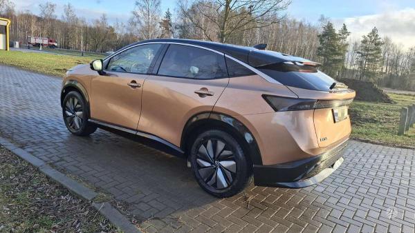 Yellow Nissan Ariya 2023 in Siauliai, with an engine capacity of 0.00 L and mileage of 50 thousand km for 36000 €, photo 8 on AUTOMOTO.COM.LV