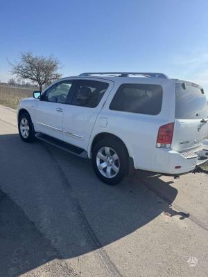 White Nissan Armada 2013 in Marijampole, with an engine capacity of 5.55 L and mileage of 140 thousand km for 12800 €, photo 5 on AUTOMOTO.COM.LV