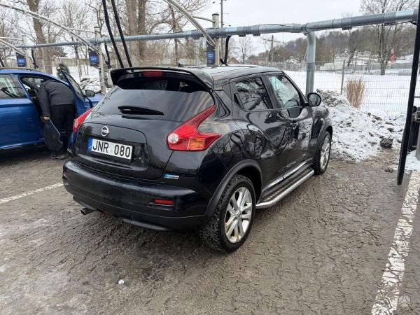 Black Nissan Juke 2011 in Vilnius, with an engine capacity of 1.46 L and mileage of 290 thousand km for 3000 €, photo 4 on AUTOMOTO.COM.LV