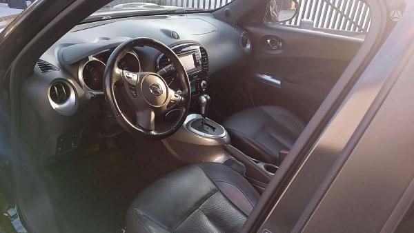 Black Nissan Juke 2012 in Siauliai, with an engine capacity of 1.62 L and mileage of 88 thousand km for 5900 €, photo 11 on AUTOMOTO.COM.LV