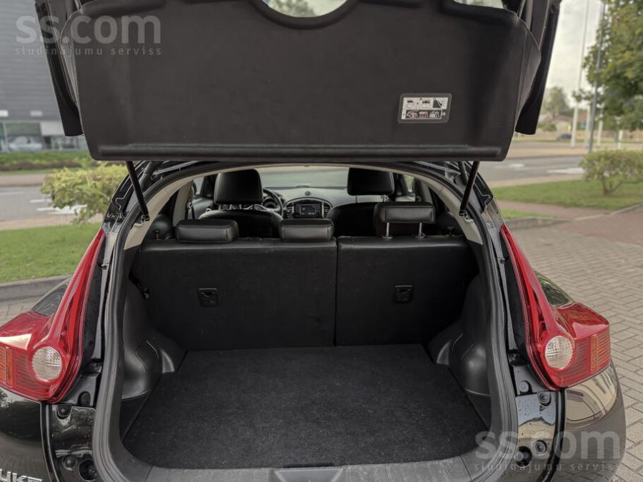 Black Nissan Juke 2012 in Jelgava, with an engine capacity of 1.60 L and mileage of 76 thousand km for 6995 €, photo 15 on AUTOMOTO.COM.LV
