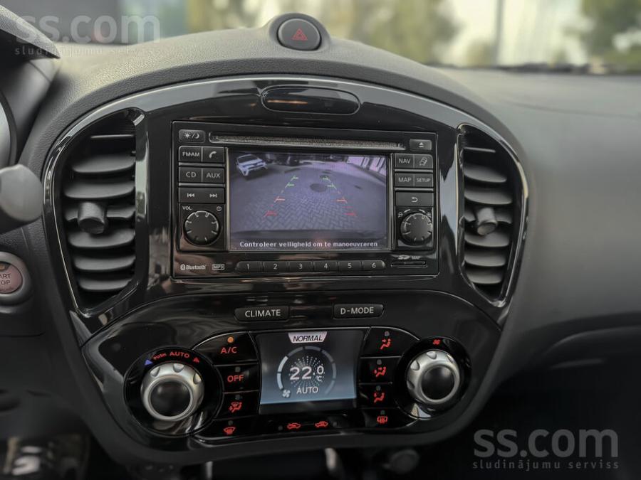 Black Nissan Juke 2012 in Jelgava, with an engine capacity of 1.60 L and mileage of 76 thousand km for 6995 €, photo 18 on AUTOMOTO.COM.LV