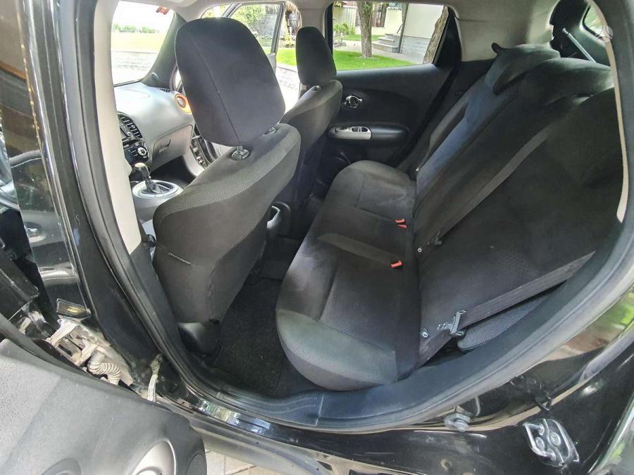 Black Nissan Juke 2013 in Siauliai, with an engine capacity of 1.50 L and mileage of 226 thousand km for 4700 €, photo 11 on AUTOMOTO.COM.LV