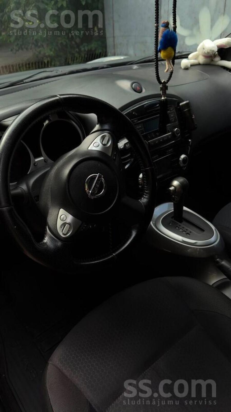 Black Nissan Juke 2013 in Riga, with an engine capacity of 1.60 L and mileage of 158 thousand km for 5200 €, photo 8 on AUTOMOTO.COM.LV