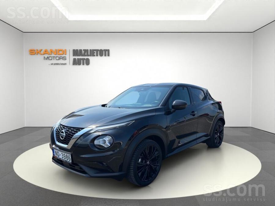 Black Nissan Juke 2021 in Riga, with an engine capacity of 1.00 L and mileage of 73 thousand km for 15490 €, photo 1 on AUTOMOTO.COM.LV