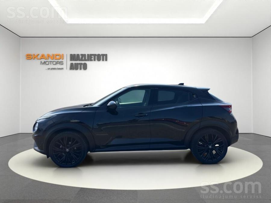 Black Nissan Juke 2021 in Riga, with an engine capacity of 1.00 L and mileage of 73 thousand km for 15490 €, photo 4 on AUTOMOTO.COM.LV