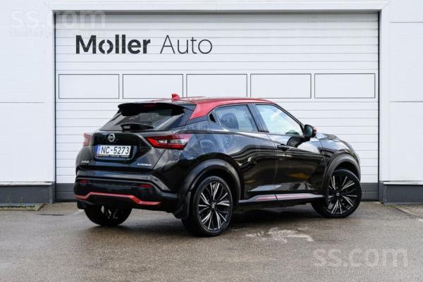 Black Nissan Juke 2022 in Riga, with an engine capacity of 1.00 L and mileage of 103 thousand km for 14950 €, photo 4 on AUTOMOTO.COM.LV