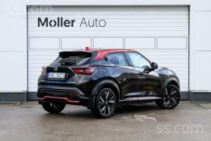 Black Nissan Juke 2022 in Riga, with an engine capacity of 1.00 L and mileage of 103 thousand km for 14950 €, photo 5 on AUTOMOTO.COM.LV