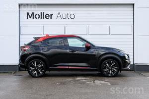 Black Nissan Juke 2022 in Riga, with an engine capacity of 1.00 L and mileage of 103 thousand km for 14950 €, photo 6 on AUTOMOTO.COM.LV