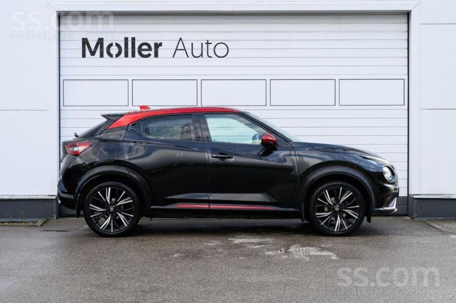 Black Nissan Juke 2022 in Riga, with an engine capacity of 1.00 L and mileage of 103 thousand km for 14950 €, photo 6 on AUTOMOTO.COM.LV