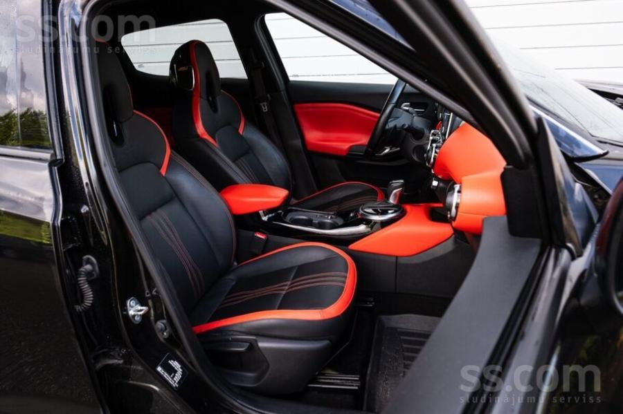 Black Nissan Juke 2022 in Riga, with an engine capacity of 1.00 L and mileage of 103 thousand km for 14950 €, photo 8 on AUTOMOTO.COM.LV